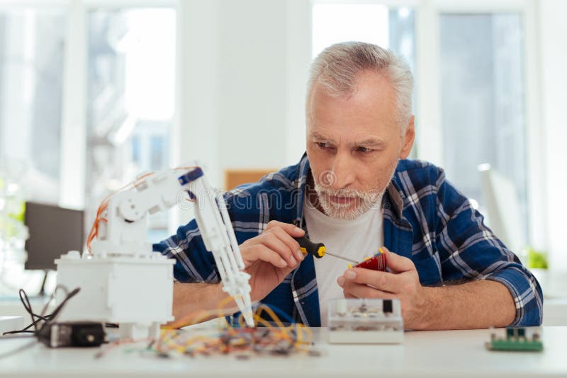Serious Smart Engineer Working Stock Image - Image of aging ...