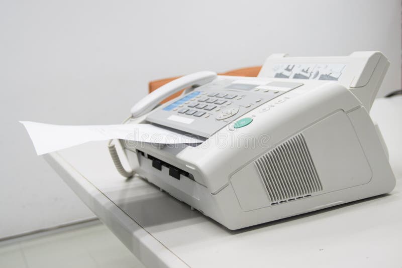 The Fax Machine for Sending Documents in the Office Stock Photo - Image ...