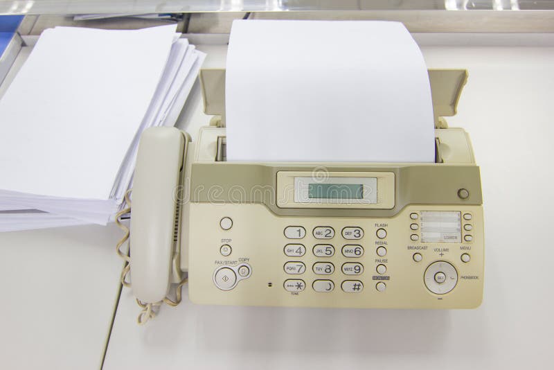 The Fax Machine for Sending Documents in the Office Stock Photo - Image ...