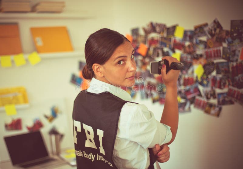FBI Female Agent Using Camera Stock Image - Image of adult, forensic ...