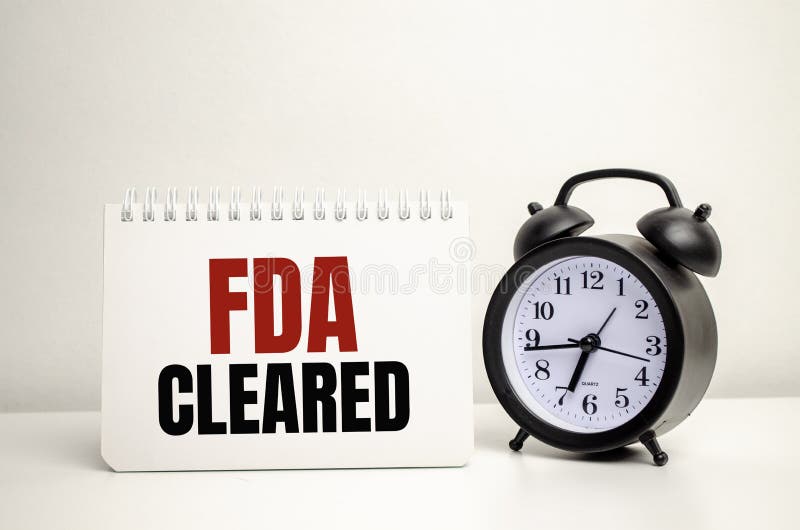 FDA Cleared Words with Clock with Notebook Stock Illustration ...