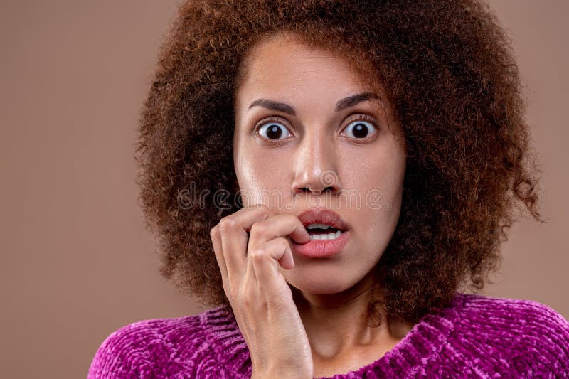 Dark-haired Young Woman Looking Frightened Stock Photo - Image of ...
