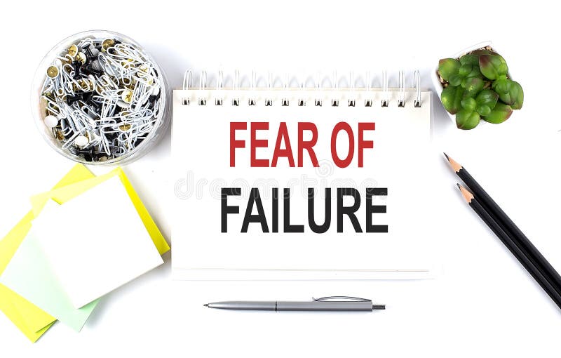 FEAR of FAILURE Text on Notebook with Office Supplies on White ...