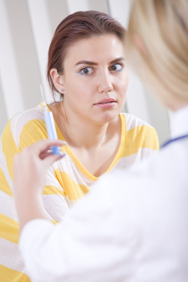 Fear of syringe injection stock photo. Image of injection - 20459794