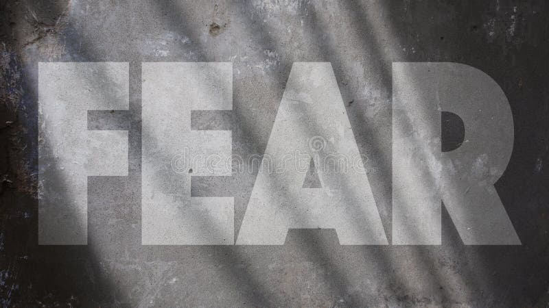 Fear Written on a Concrete Wall Stock Image - Image of shadow, plaster ...