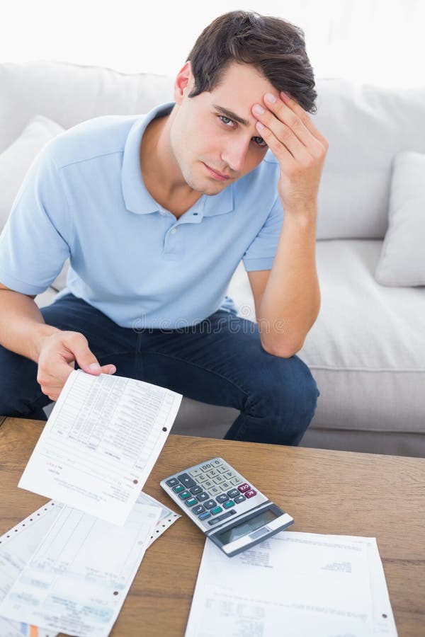 Fearful Man Doing His Accounts with a Calculator Stock Image - Image of ...