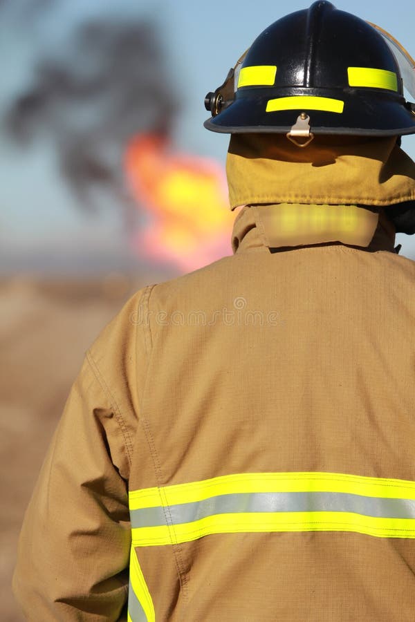 Fireman watching stock image. Image of spray, rain, fireman - 120249