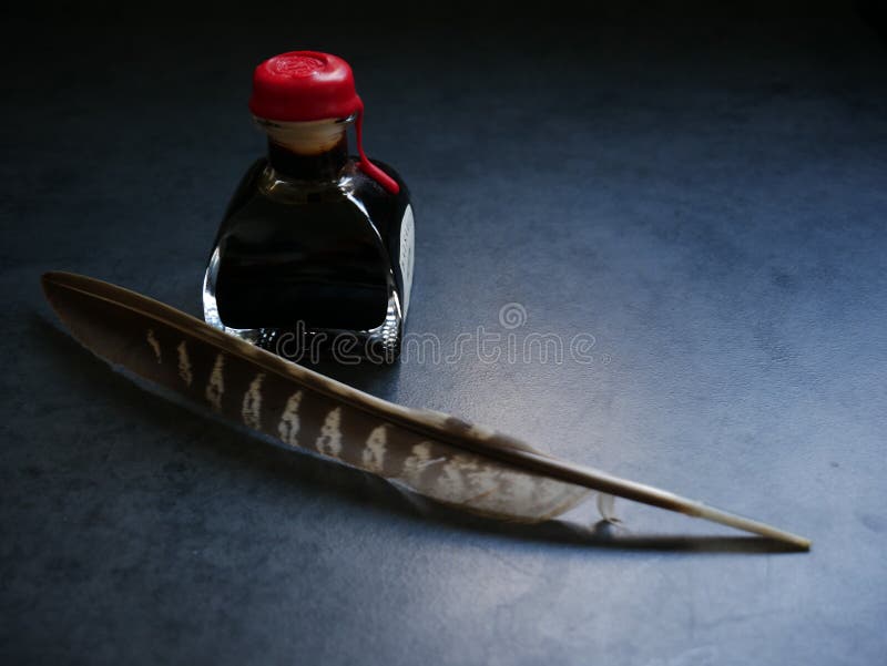 Feather and Ink Pot on Grey Surface Stock Photo - Image of writer ...