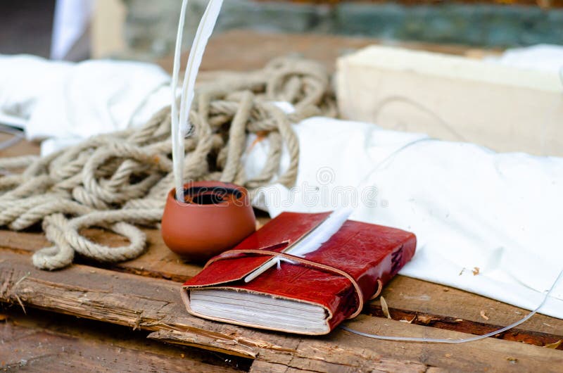 Feather Quill Pen and Old Leather Bound Note Book Stock Photo - Image ...