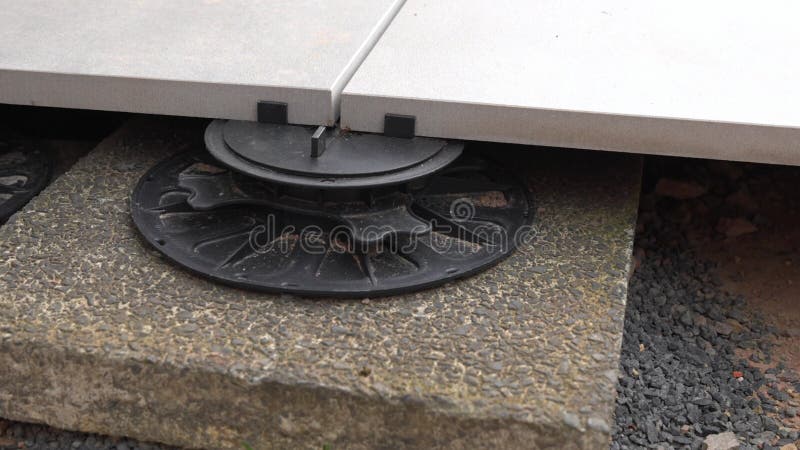 Patio Tiles Installed on Adjustable Plastic Supports for Flexibility ...