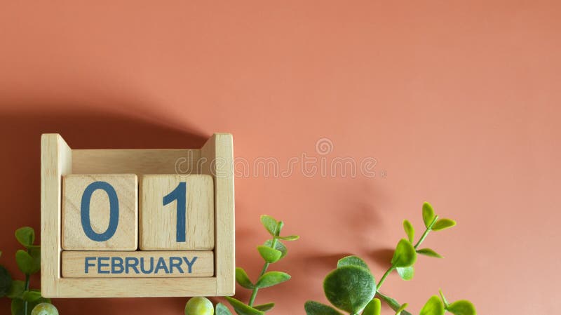 February 01, Date Design with Calendar Cube and Leaf on Orange ...