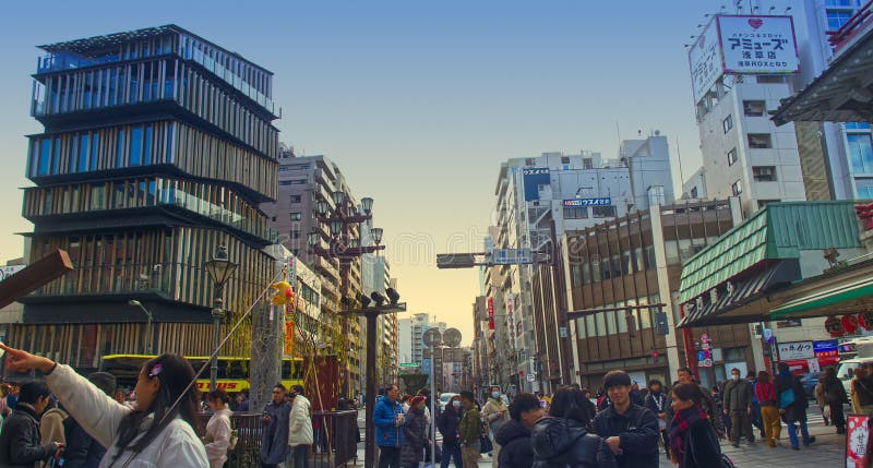 Group of Tourists Walking and Visiting in Tokyo, Japan Editorial ...