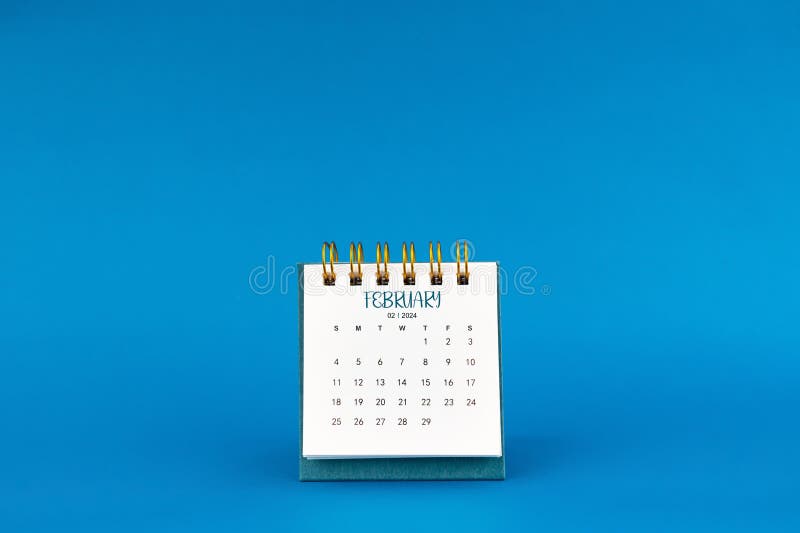 February 2024 Mini Desk Calendar on Blue Background Stock Photo - Image ...