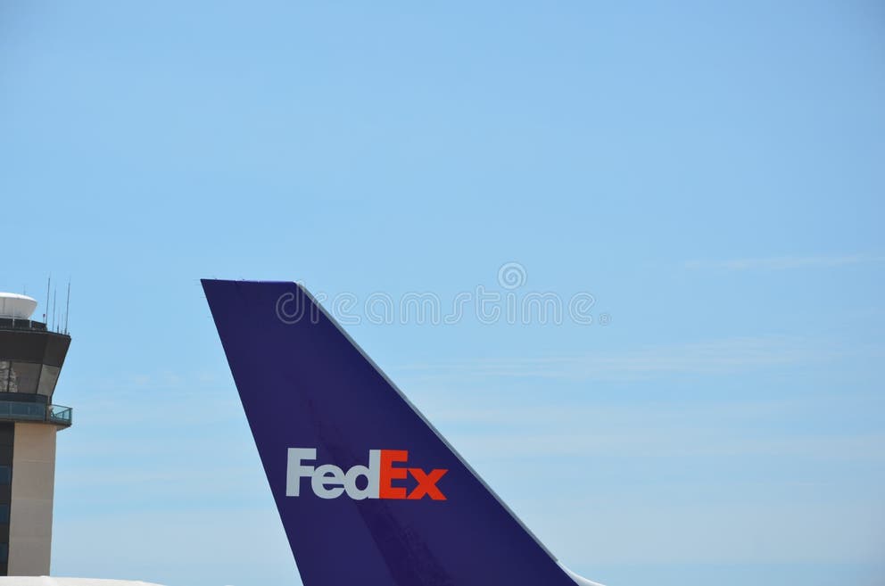 FedEx Airplane and Blue Sky Editorial Image - Image of fedex, package ...