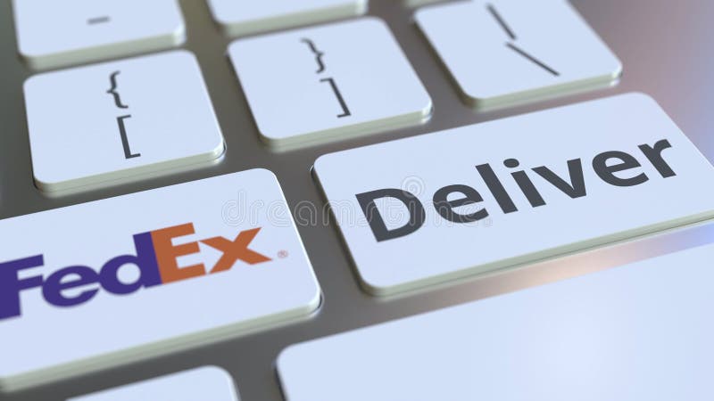 FEDEX Company Logo and Deliver Text on the Keys of the Computer ...