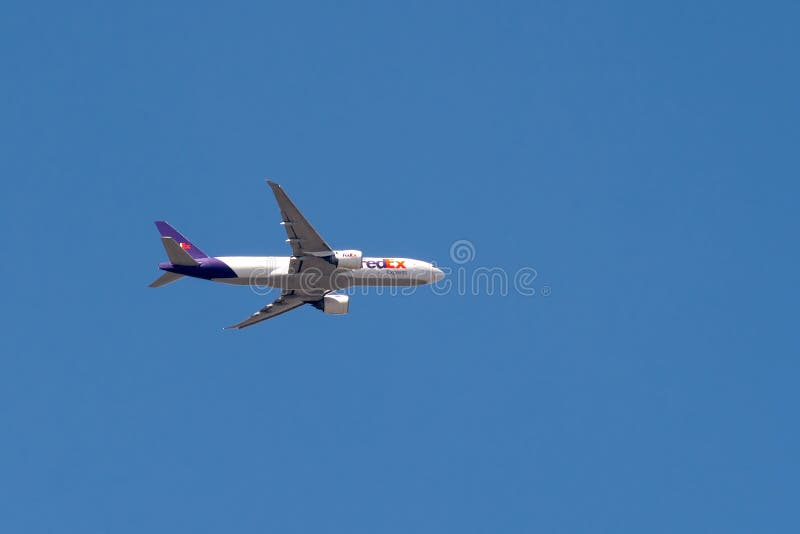 FedEx Express Airplane in Flight Editorial Photo - Image of airport ...