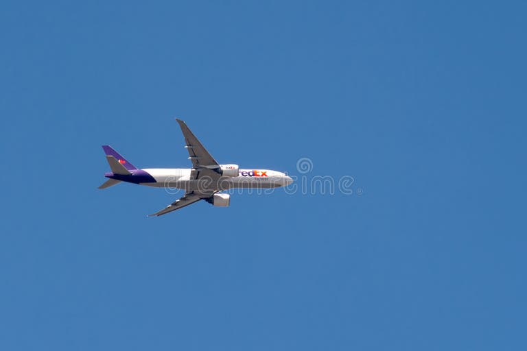 FedEx Express Airplane in Flight Editorial Photo - Image of airport ...