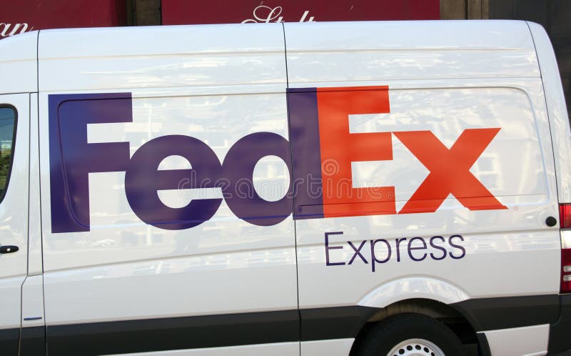 Fedex on a transport bus editorial stock photo. Image of street - 77733183