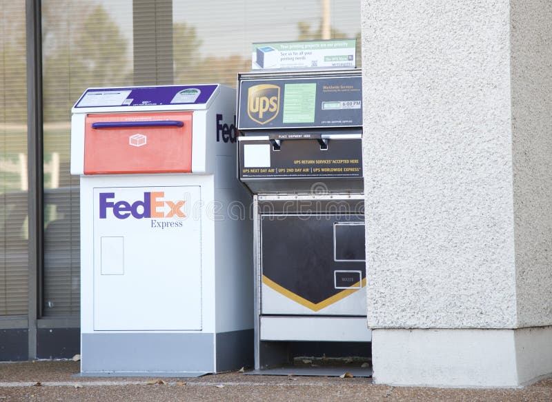 A UPS and FedEx Drop Boxes in a Garage Next To an Office Building ...