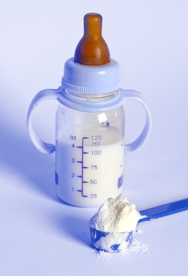 Feding bottle with milk stock image. Image of teat, artificial - 13755017