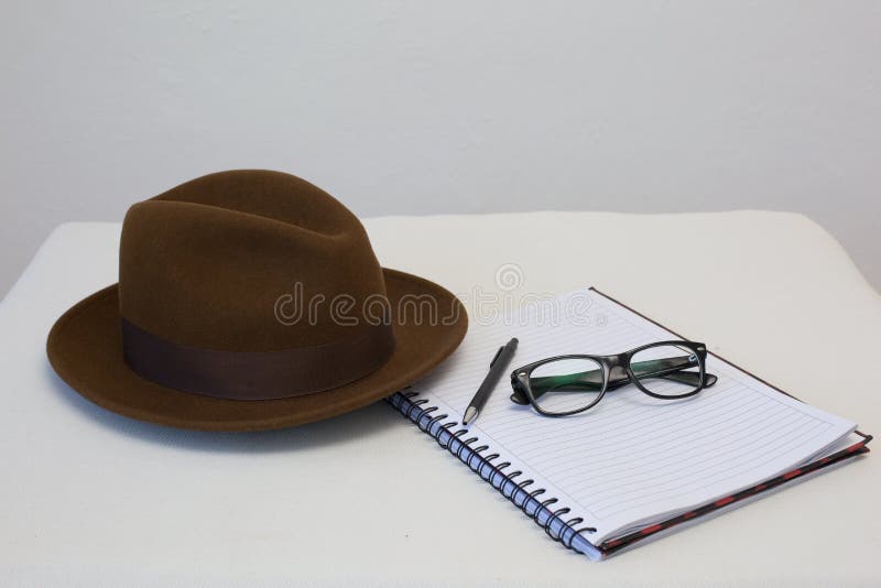 Fedora hat writer stock photo. Image of eyeglasses, page - 75670330