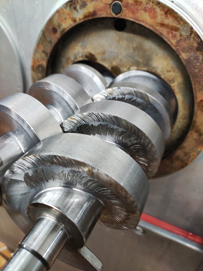 The Feed for the Meat Grinder is Sticking Out of the Machine Stock ...