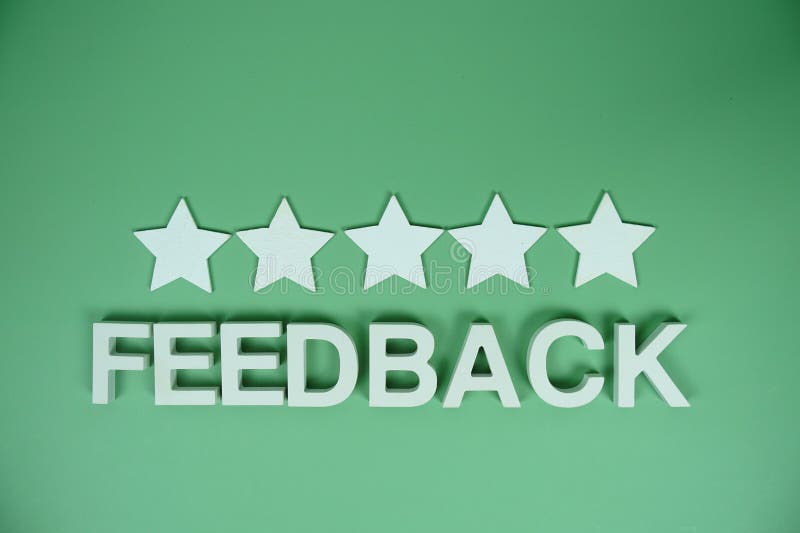 Feedback Alphabet Letters with Five Star Top View on Green Background ...