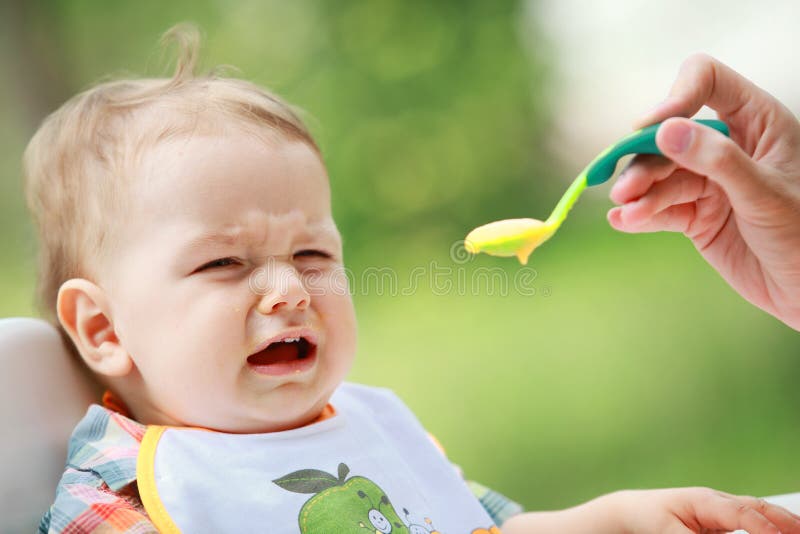 Feeding stock photo. Image of dining, infant, crying - 12378968