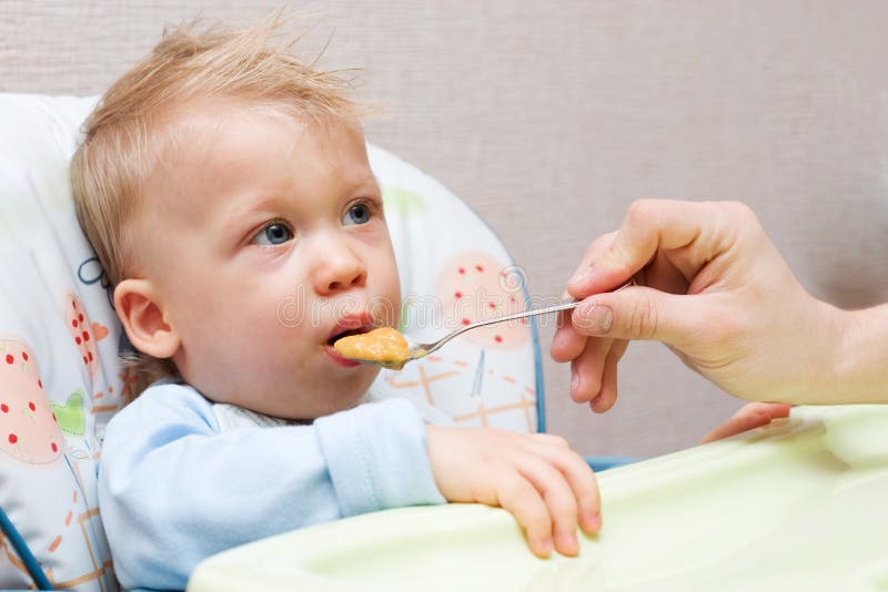 Feeding a child stock photo. Image of infant, baby, child - 2445606