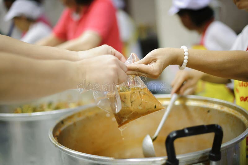Feeding Helps Eliminate the Hunger of Many People Stock Photo - Image ...