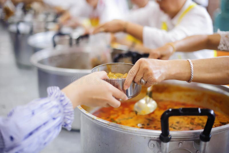 Feeding Helps Eliminate the Hunger of Many People Stock Image - Image ...