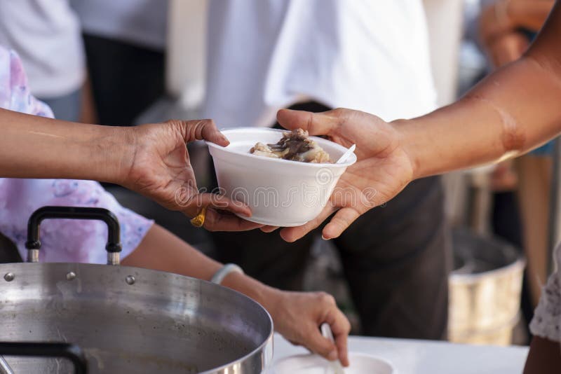 Feeding the Poor To Alleviate Hunger. Give Concept Stock Photo - Image ...