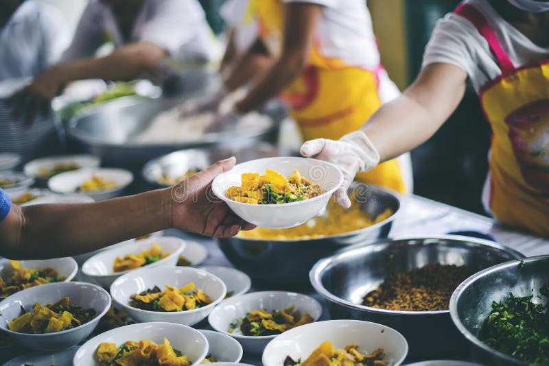 Feeding the Poor To Help Each Other in Society. Charity Concept Stock ...