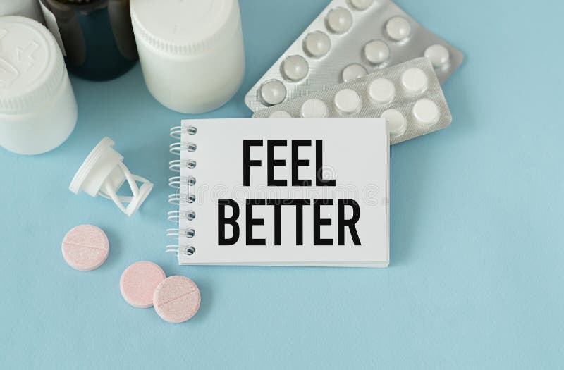 Feel Better Text in a Notebook. a Medical Concept and Pils, Text on the ...