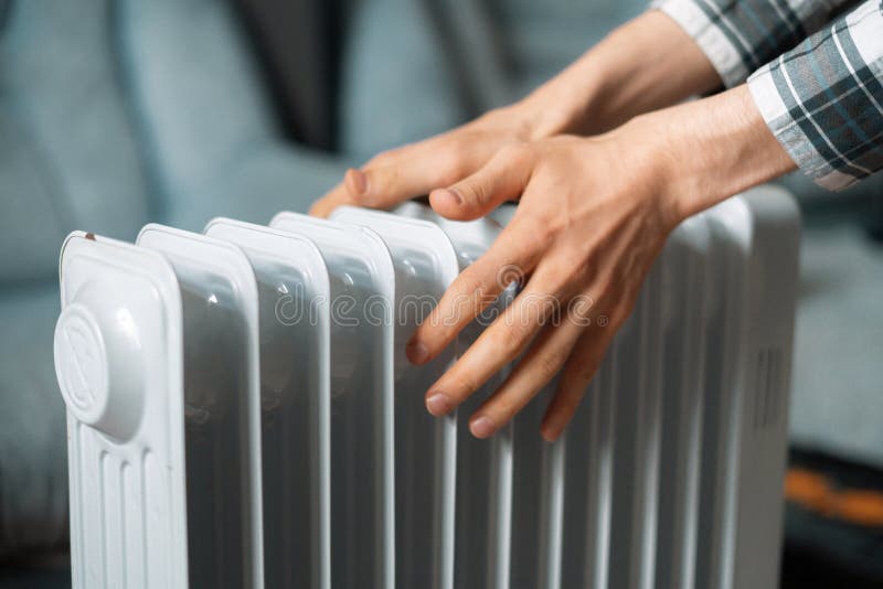 Feeling Cold, Getting Warm, Hands Touching Heater Close Up Stock Photo ...