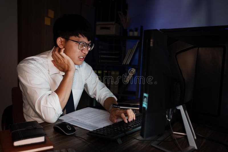 Feeling Exhausted or Tired Businessman Working Late on Computer at ...