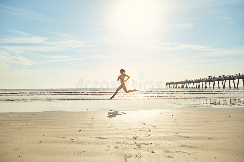 Feeling Free in Nature. an Attractive Young Woman on the Beach. Stock ...