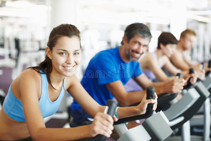 Feeling Good during the Warm Down. a Row of People Working Out on the ...