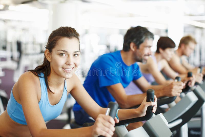 Feeling Good during the Warm Up. a Row of People Working Out on the ...