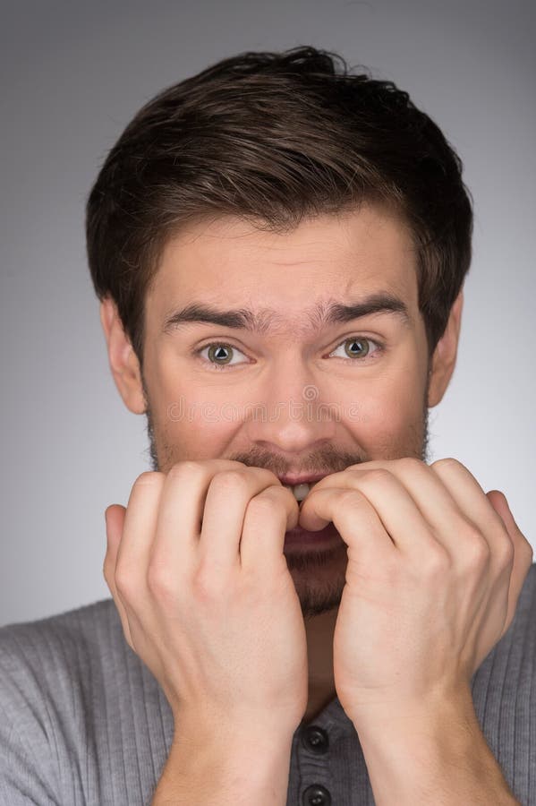 Feeling Scared. Portrait of Scared Young Men Looking at Camera W Stock ...