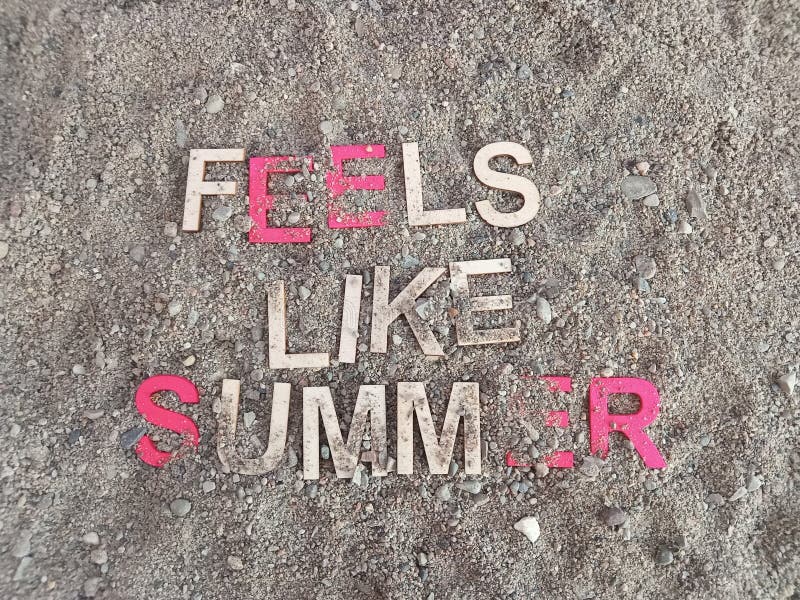 Feels Like Summer Written on Sand and Partially Covered by Sand Stock ...