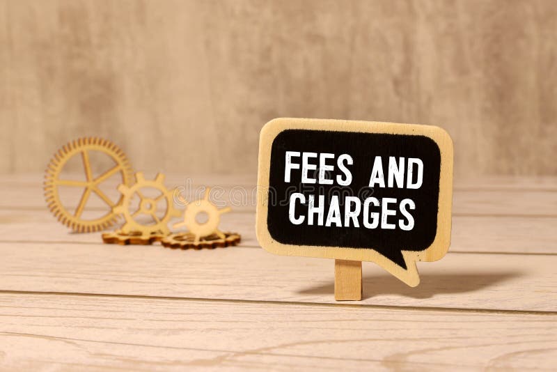 Fees and Charges Message Written on Ripped Torn Paper with Blue ...