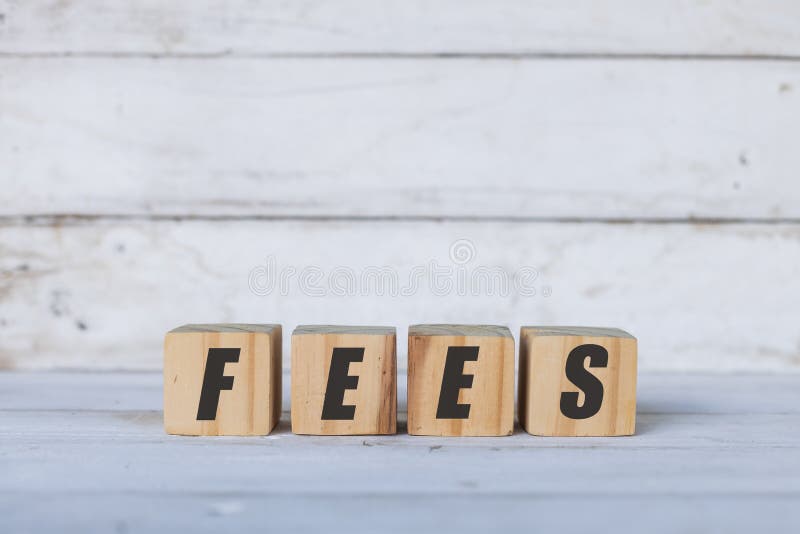 Fees Concept Written on Wooden Cubes or Blocks, on White Wooden ...