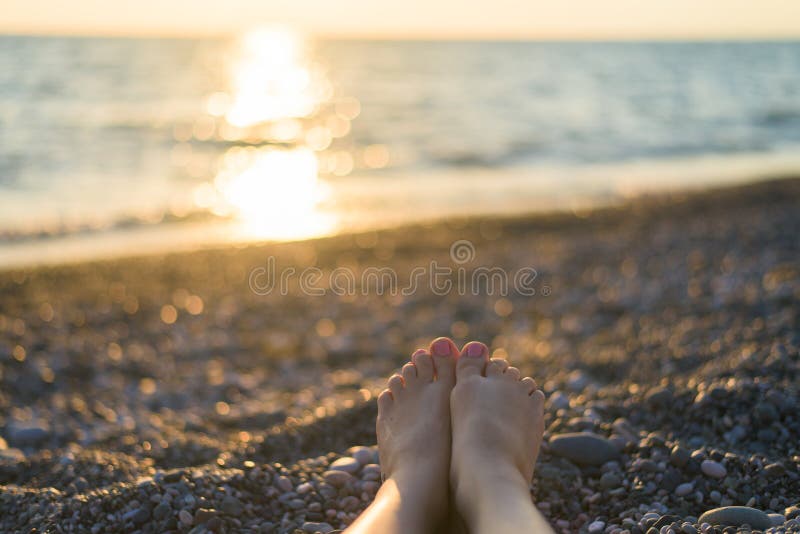 Feet Against the Sea at Sunset Stock Image - Image of leisure, barefoot ...