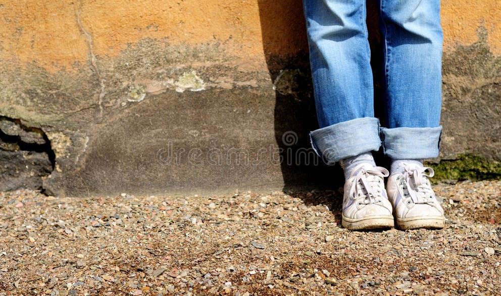 Feet against the wall stock photo. Image of tied, wall - 12843808