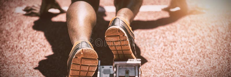 Feet of an Athlete on a Starting Block about To Run Stock Photo - Image ...