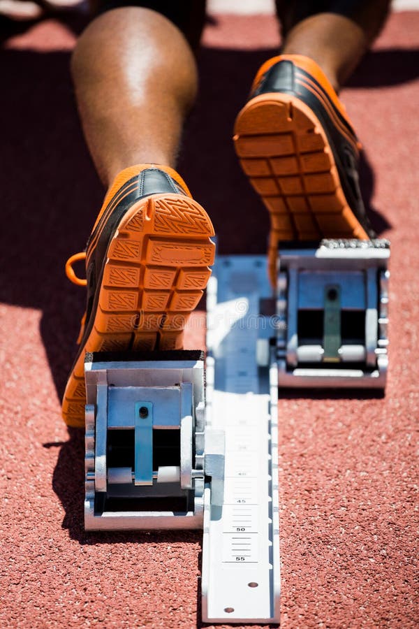 Feet of an Athlete on a Starting Block about To Run Stock Image - Image ...