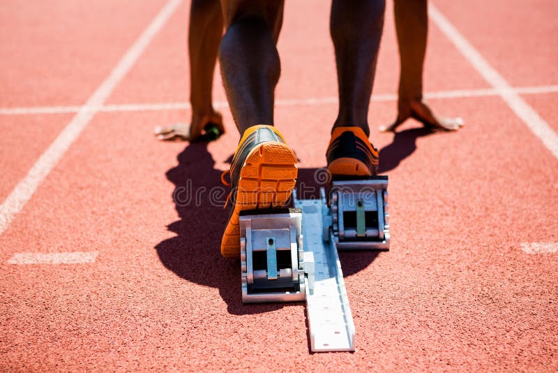 Feet of an Athlete on a Starting Block about To Run Stock Image - Image ...