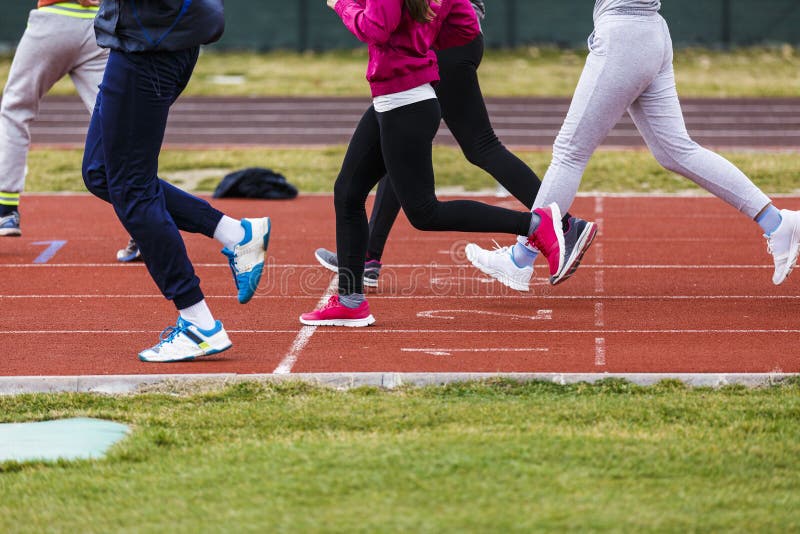 Feet of Athletes on a Track Stock Image - Image of outdoors, running ...