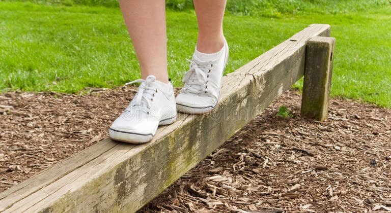 Feet Balancing on a Balance Beam. Stock Image - Image of walk, youth ...
